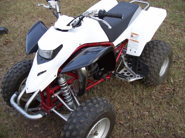 My 2005 Blaster. Those stock balloon tires and rear axle have since ...